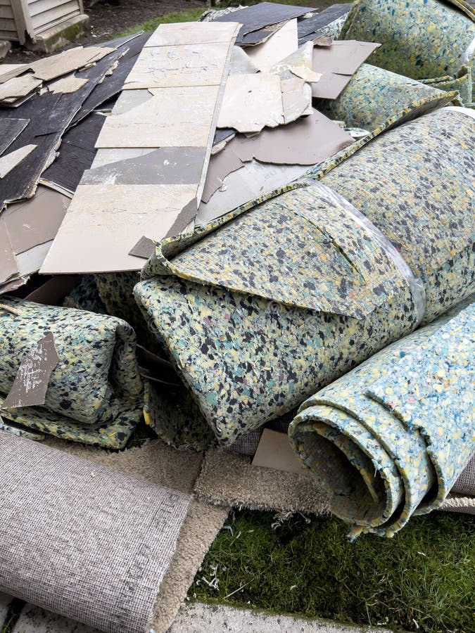 Selective Focus on Ripped Up Old Carpet Discarded in the Yard Outside ...