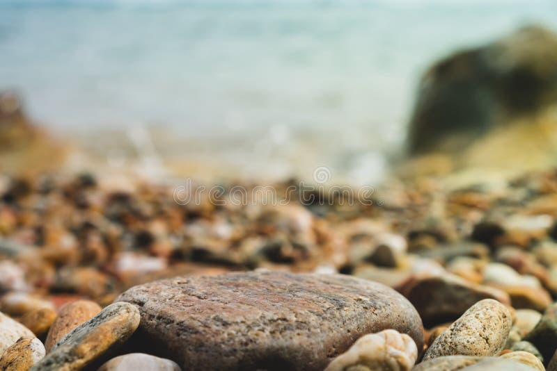 Selective Focus on Rocks Texture with Blur Beach. Stock Photo - Image ...