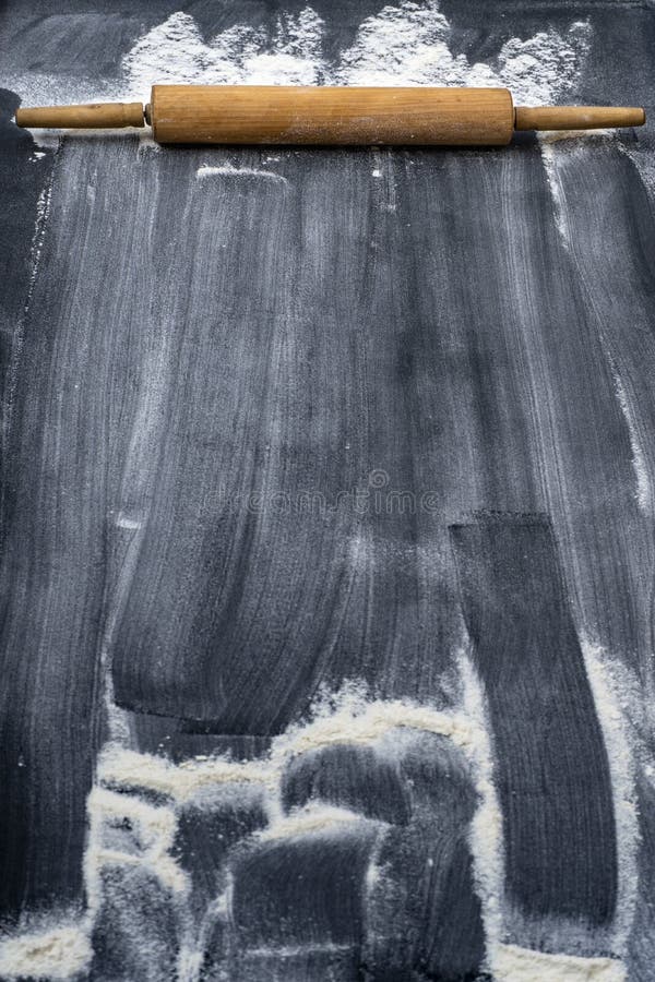 Rolling Pin And Wheat Flour On A Dark Background. Free Space For Text ...