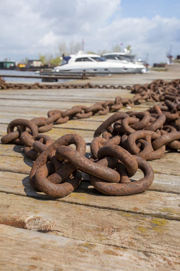 Selective Focus. Rusty Chain on the Wooden Pier Stock Image - Image of ...