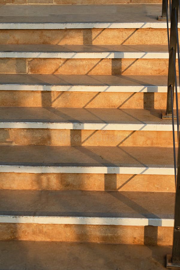 Selective Focus on the Shade of the Morning Sun on the Steps of the ...