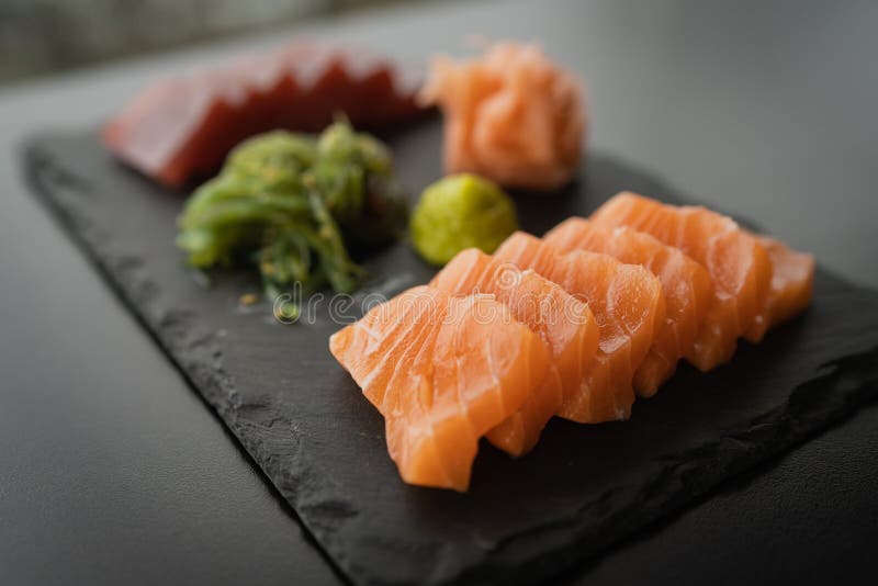 Selective Focus Shot of Assorted Japanese Sashimi on a Board Stock ...