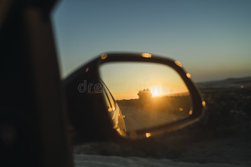 Selective Focus Shot of Beautiful Sunset Seen through the Car Side ...