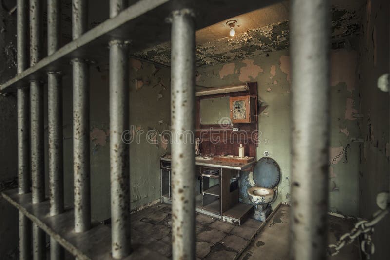 Old Rusted Jail Cell Door in Solitary Confinement Stock Photo - Image ...