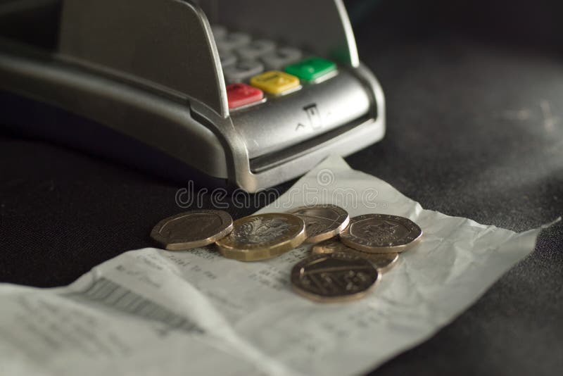 Selective Focus Shot of Coins on a Receipt on Payment Machine ...