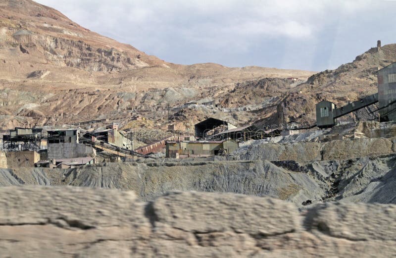 Selective Focus Shot of Factory Buildings on the Side of a Mountain ...