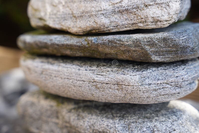 Selective Focus Shot of Flat Wide Rocks Stack Together Creating a Tower ...