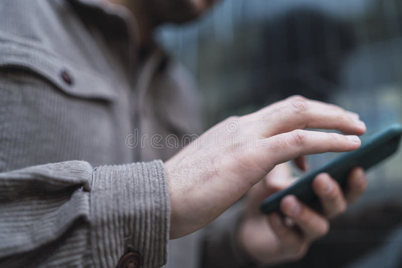 Selective Focus Shot of a Male Hand Scrolling on the Phone Stock Image ...