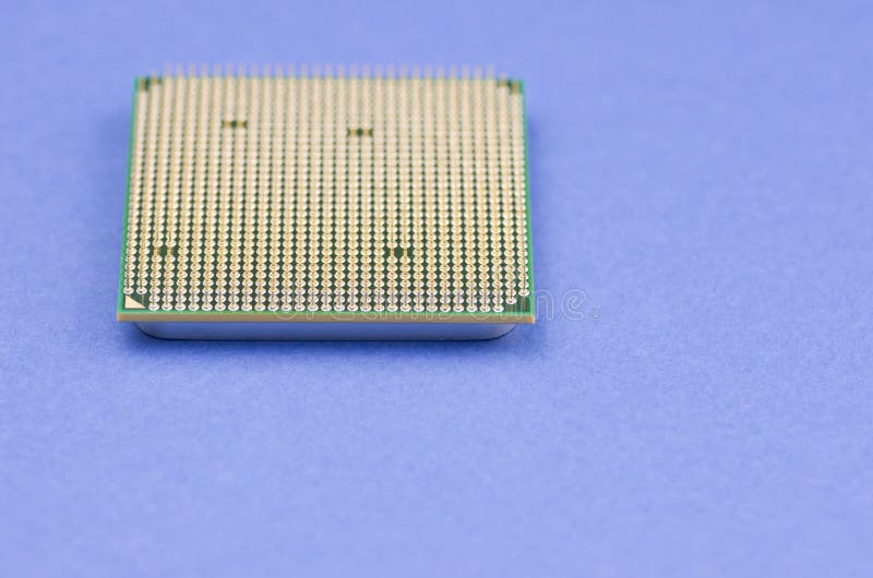 Selective Focus Shot of Microprocessor Isolated on a Blue Surface Stock ...
