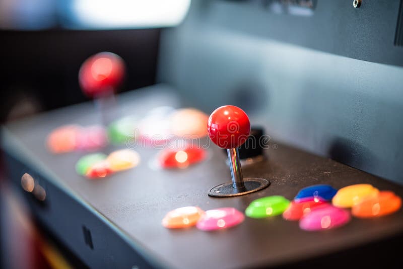 Selective Focus Shot of a Red Arcade Joystick of a Gaming Machine in an ...