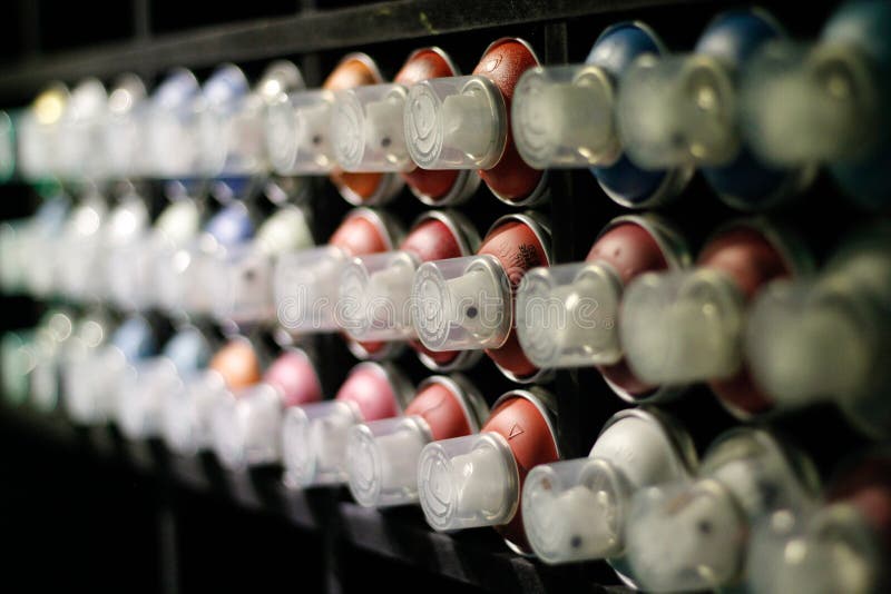 Selective Focus Shot of Red and Blue Spray Paint Canes Stacked on the ...