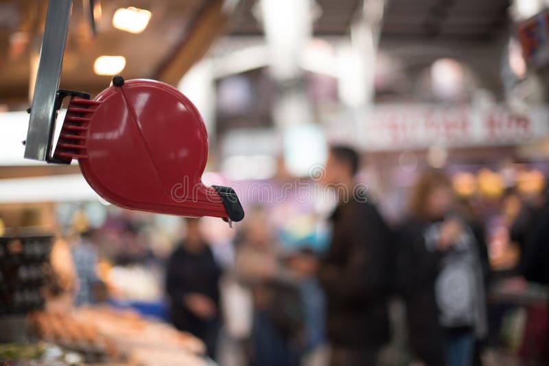 Selective Focus Shot of a Red Ticket Dispenser Stock Image - Image of ...