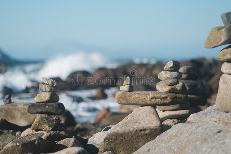 Selective Focus Shot of Rocks Stacked upon Each Other at the Beach ...