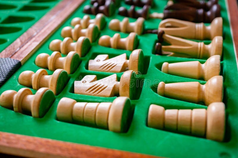 Selective Focus Shot of a Set of Wooden Chess Pieces in a Green Box ...