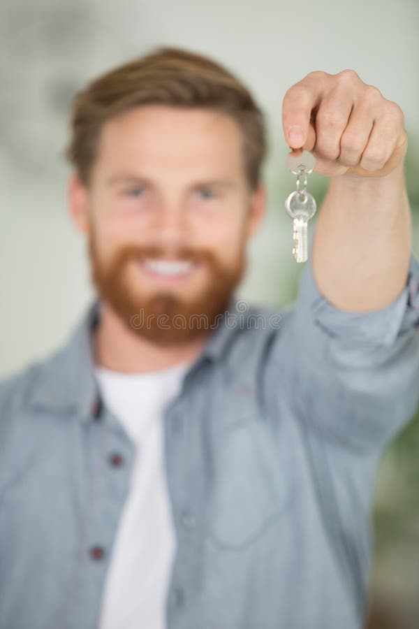 Selective Focus Shot Smiling Man Holding Keys Stock Photo - Image of ...