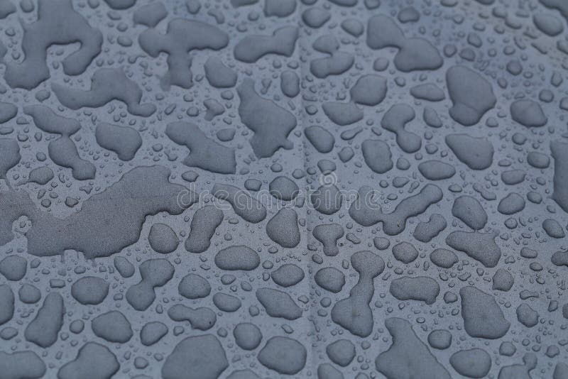 Selective Focus Shot of Water Droplets on Plastic Film after Rain Stock ...