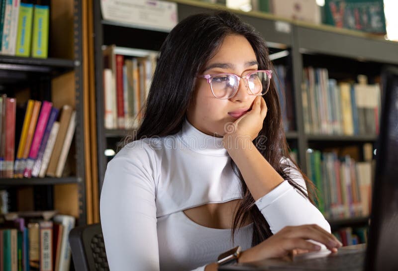 Selective Focus Shot of a Young Female from Colombia Reading on ...