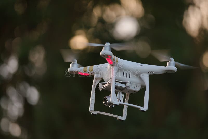 15 - Selective Focus Side View of Hovering Remote Control Drone ...