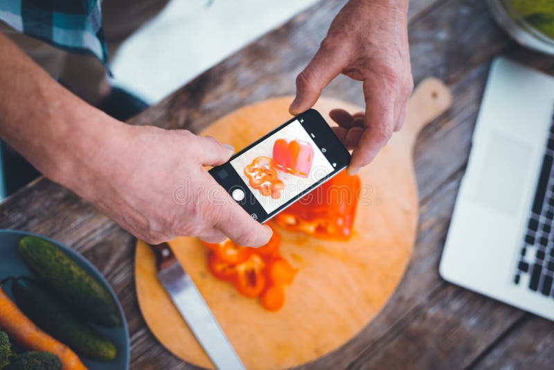 Selective Focus of a Smartphone Screen with Photos of Food Stock Image ...