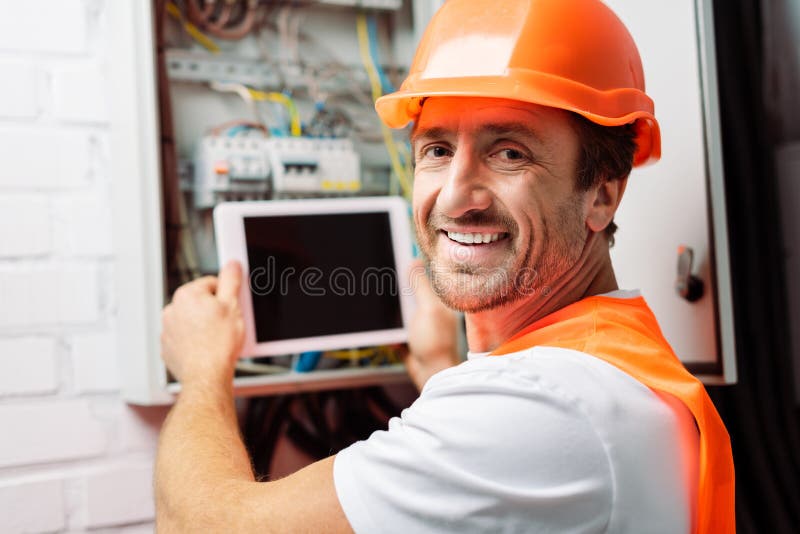 Smiling Electrician with White Cable Coil Stock Photo - Image of person ...