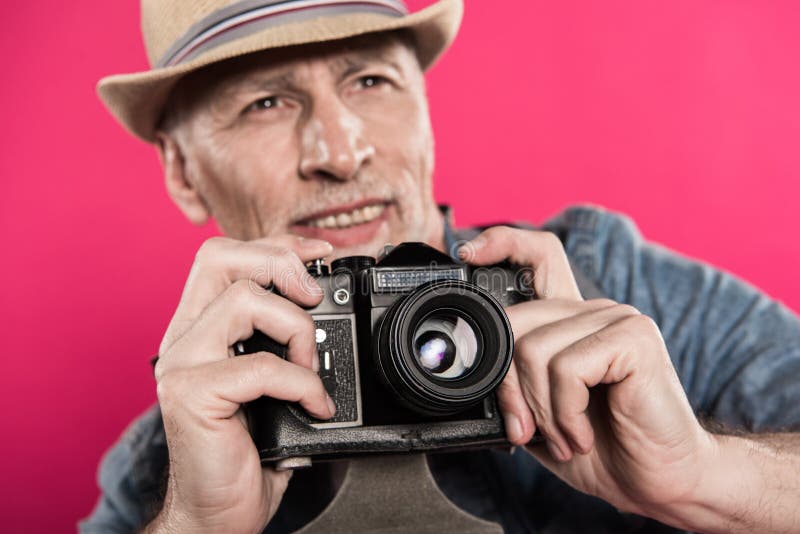 Selective Focus of Smiling Man with Retro Photo Camera Looking Away ...