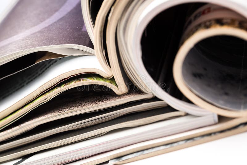 Selective Focus of the Stacking Magazine Place on White Background ...