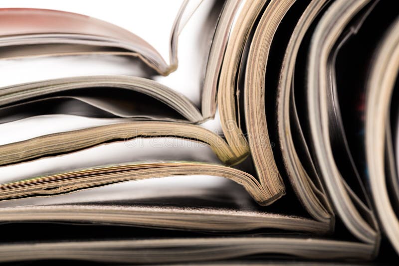 Selective Focus of the Stacking Magazine Place on White Background ...