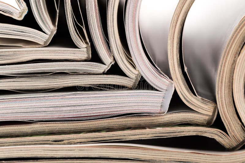 Selective Focus of the Stacking Magazine Place on White Background ...
