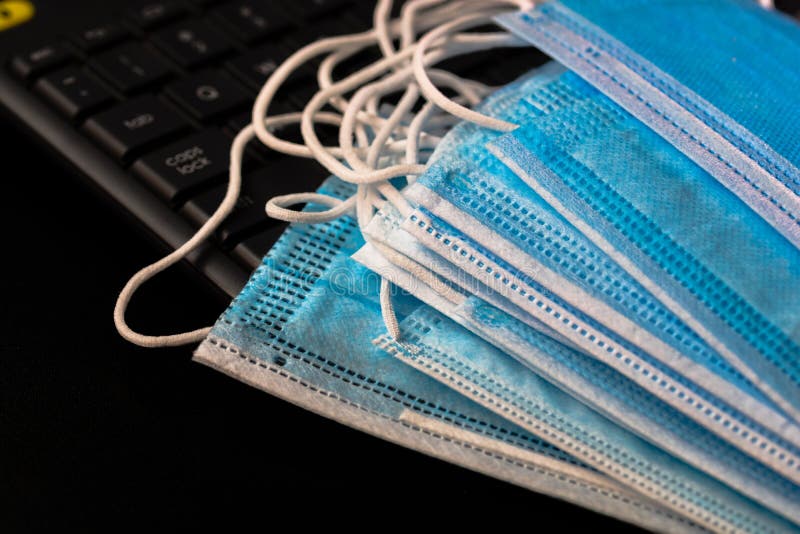 Selective Focus on Surgical Mask Isolated on Laptop Keyboard Stock ...