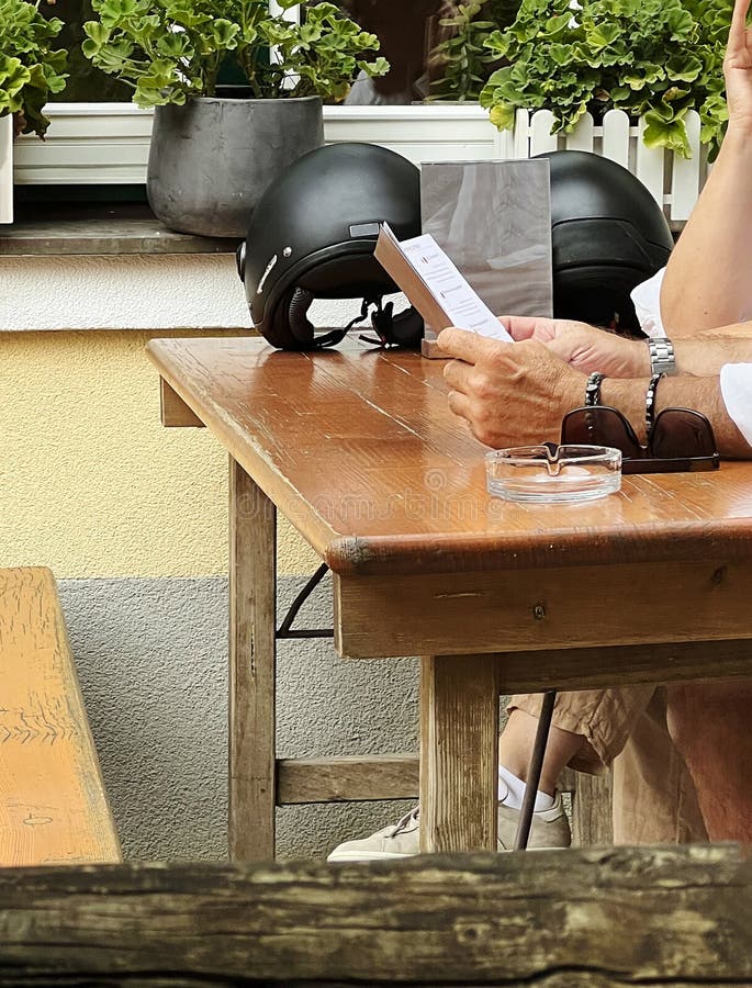 Selective Focus on Table and Hands of Man Holding Menu Stock Image ...