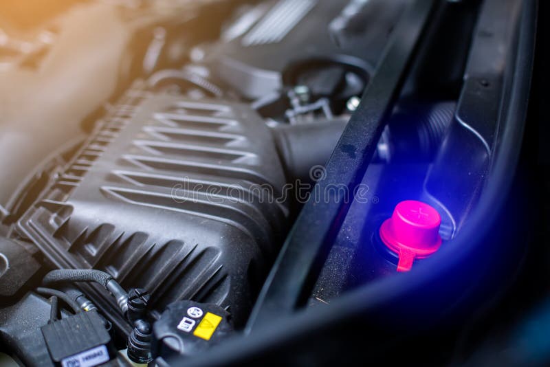 Selective Focus To Battery Anode in the Car Engine Room. Red Plus Pole ...