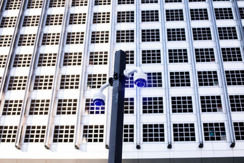 Selective Focus To CCTV Camera with Blurry Building Stock Photo - Image ...