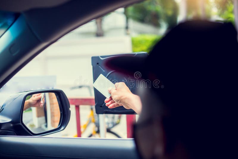Selective Focus To Driver Hold Card To Scan at Card Reader Station for ...