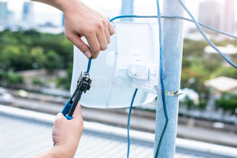 Selective Focus To Engineer S Hand Crimping RJ45 LAN Cable with Blurry ...