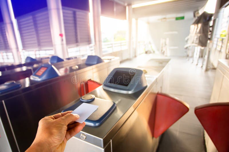 Selective Focus To Hand of Passenger Using Smart Card To Open Automatic ...