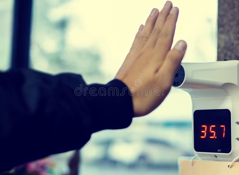 Selective Focus To Temperature Scanning Machine at Hand for Fever Stock ...