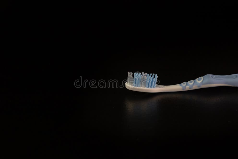 Selective Focus on Toothbrush Isolated on Black Background Stock Photo ...