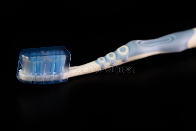 Selective Focus on Toothbrush Isolated on Black Background Stock Photo ...