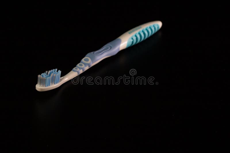 Selective Focus on Toothbrush Isolated on Black Background Stock Photo ...