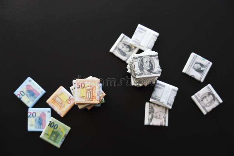 Selective Focus on Top of Stack of Wrapper with Euro and Dollars Signs ...