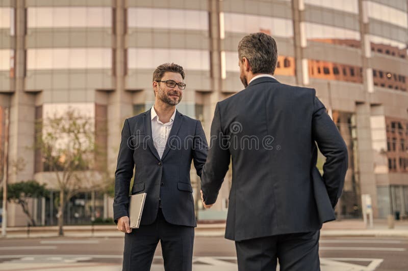Selective Focus of Two Businessmen Deal with Handshake Outdoor Stock ...