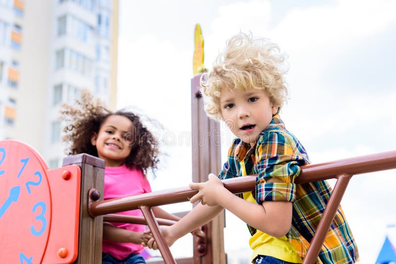 Selective Focus of Two Multiethnic Little Kids Having Fun Stock Image ...
