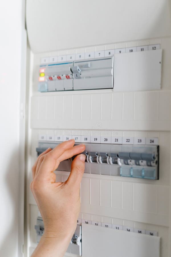 Selective Focus on Woman Hand Turning on Button on Electric Control ...