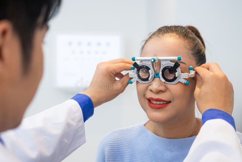 Eye Doctor with Trial Frames Stock Image - Image of ophthalmic, eyecare ...