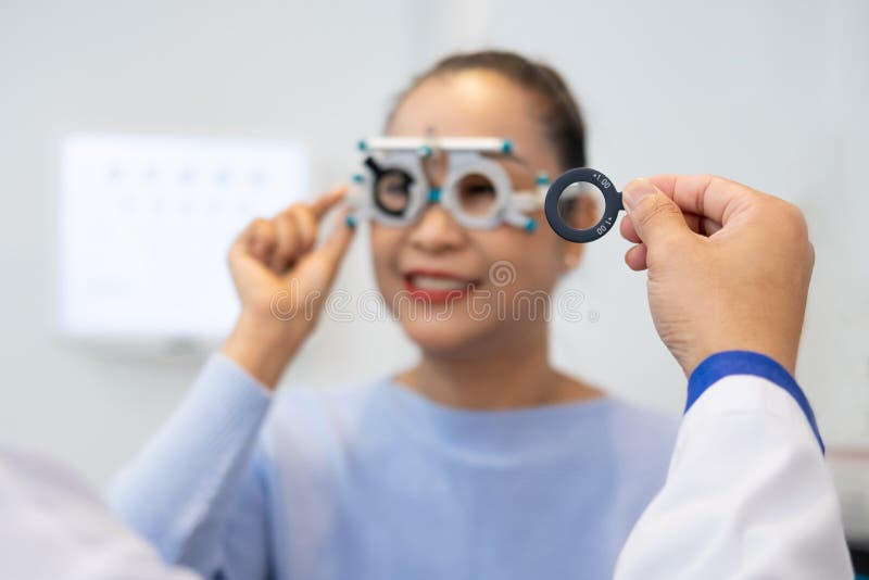 Selective Focus at Women Face. while Doctor Using Optometry Equipment ...