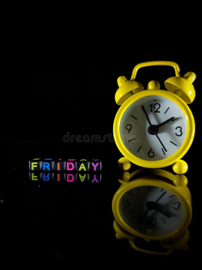 Selective Focus.Word FRIDAY from Black Dice with Yellow Clock and ...
