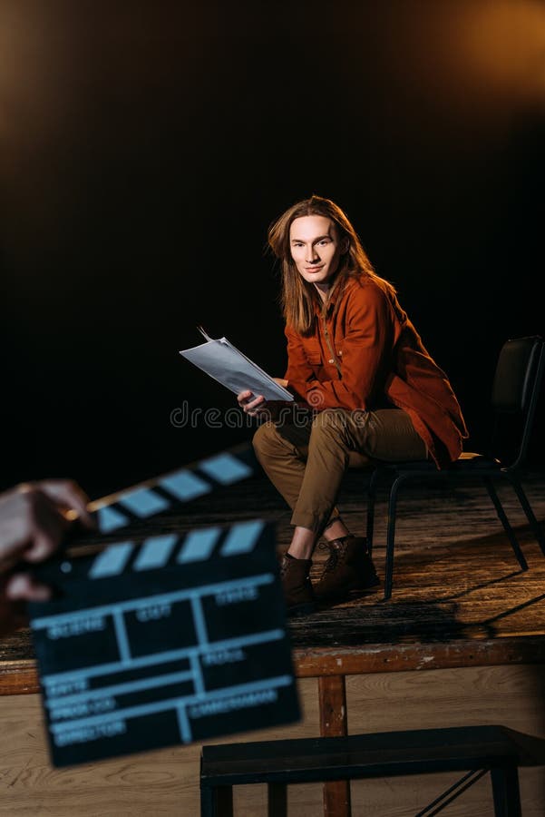 Young Actor on Stage with Clapperboard Stock Photo - Image of emotional ...