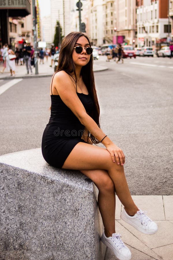 Young Hispanic Woman Posing on a Summer Day while Strolling through a ...