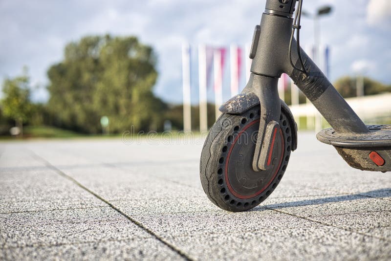 Selective Shot of an Electric Scooter S Front Wheel and Its Stem, on a ...