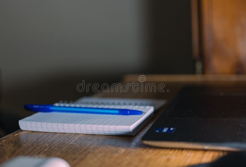 Selective Shot of a Spiral Notebook with a Blue Pen Placed on it, Note ...